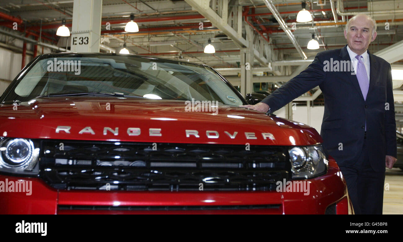Business Secretary Vince Cable leans on the new Evoque Range Rover ...