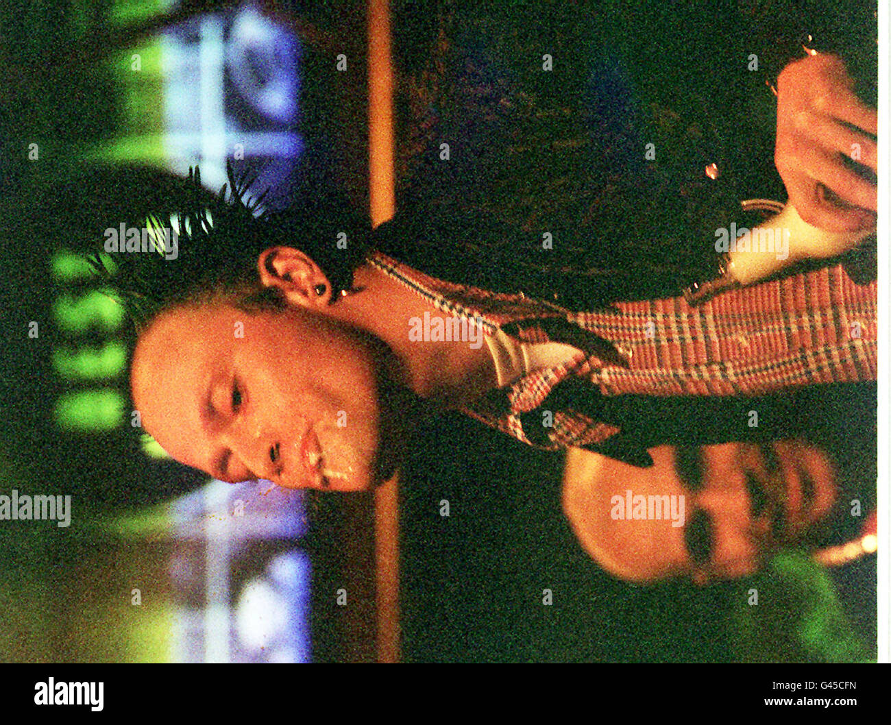 Keith Flint of The Prodigy, spits out his beer after the band won the ...