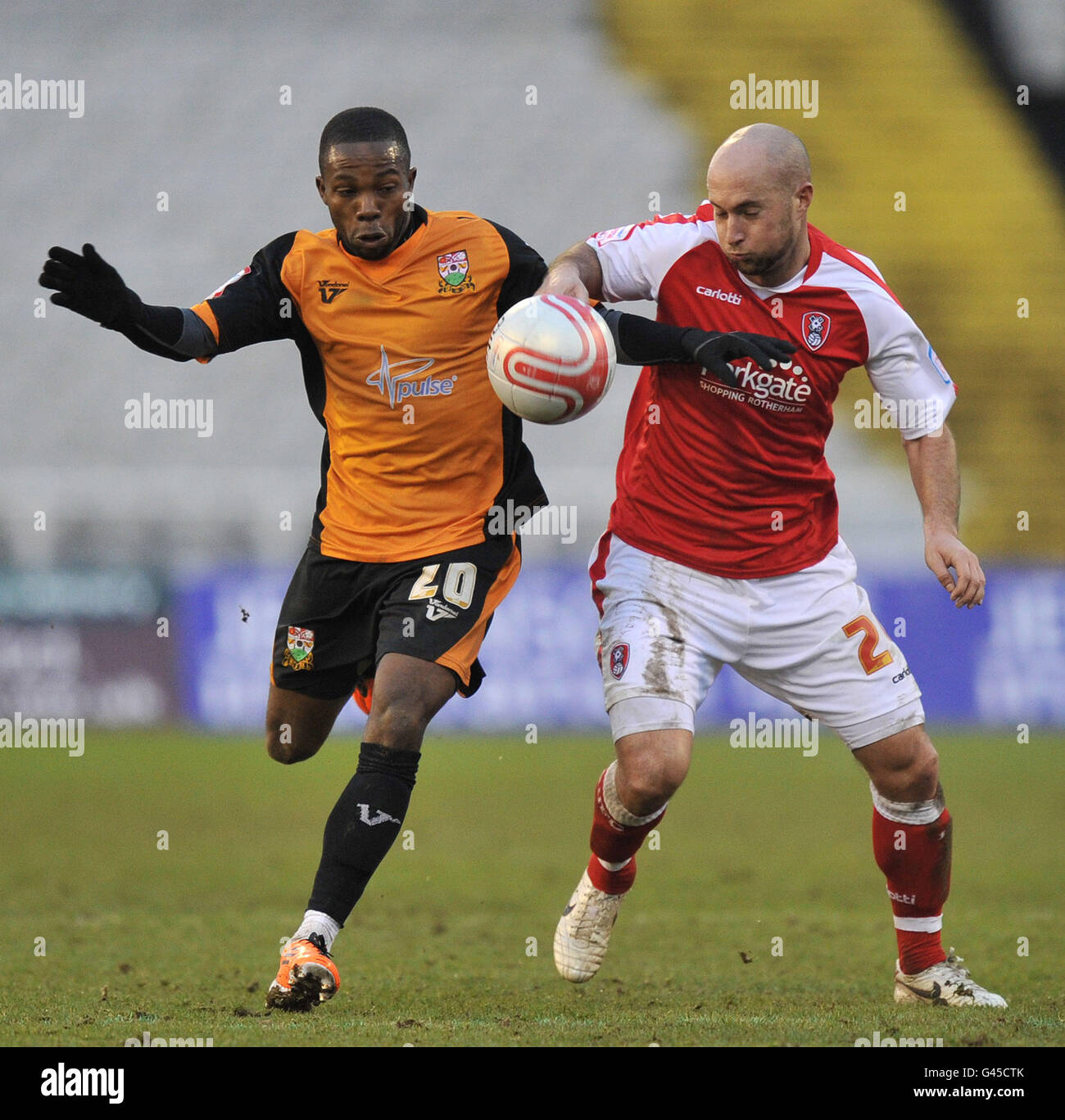 Rotherham United's Daniel Coid and Barnet's Mark Marshall battle for ...