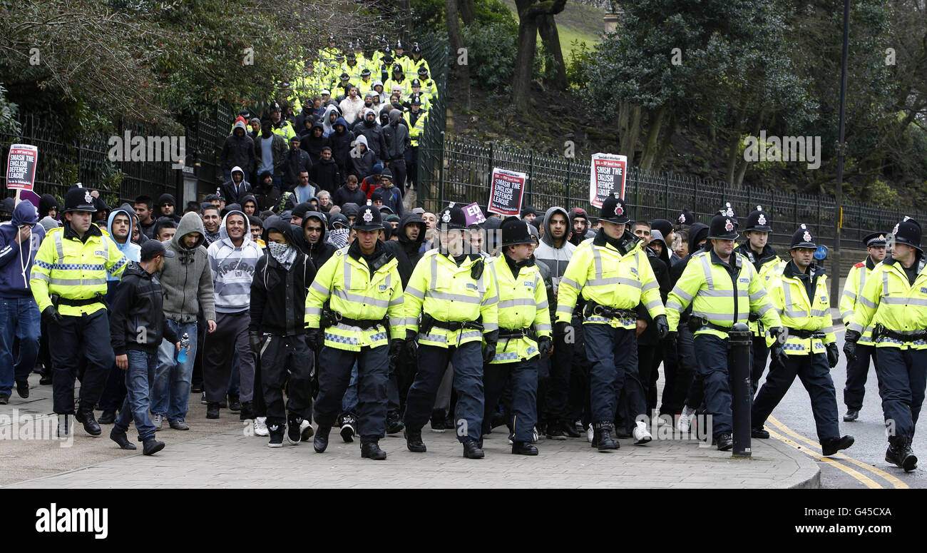 Anti EDL protesters clash with members of the English Defence League as ...