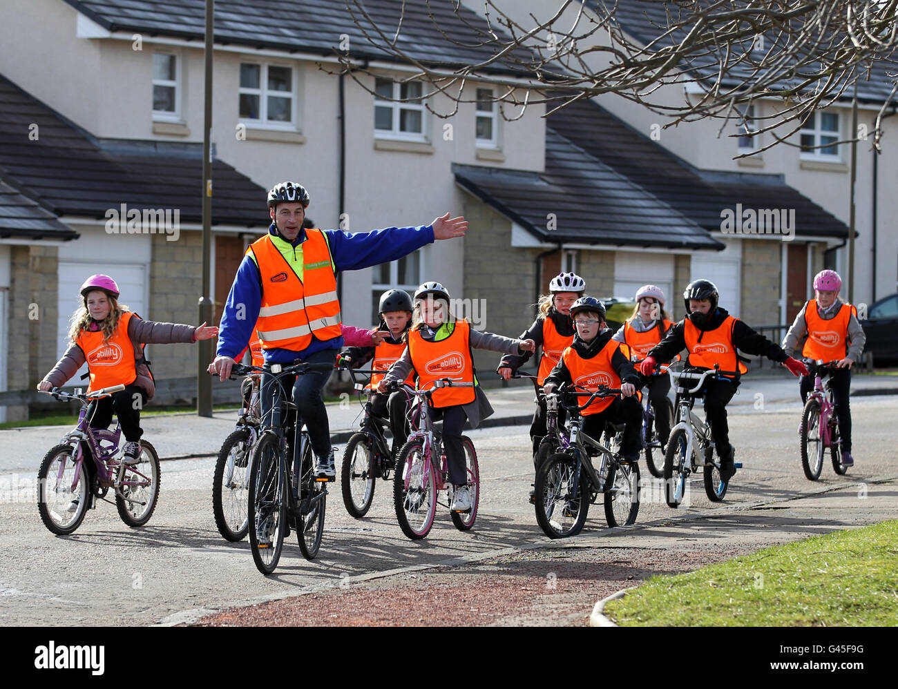 Scottish Cycling legend Graeme Obree is pictured with children from ...