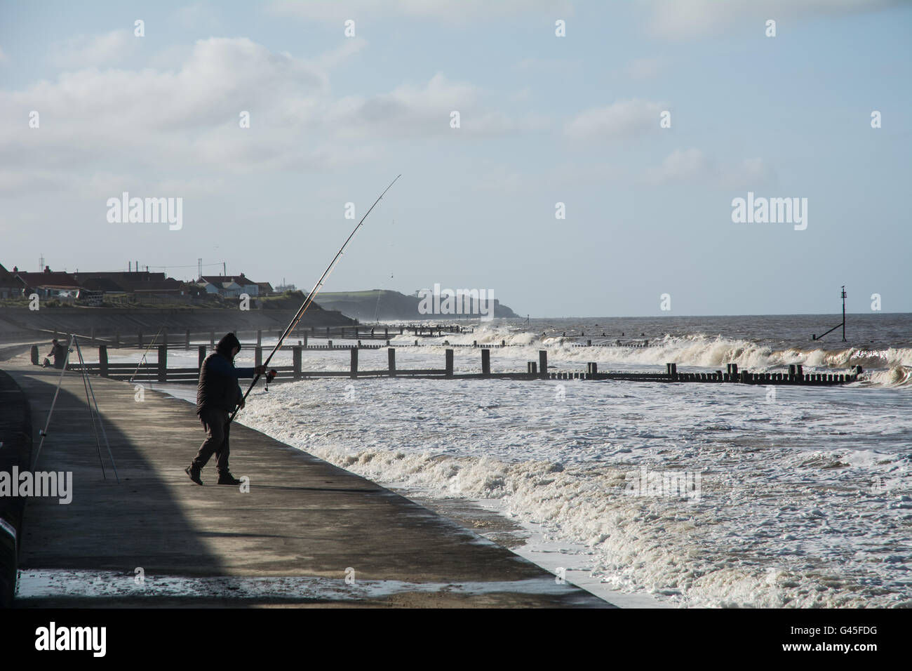 Fisherman reeling in fish hi-res stock photography and images - Alamy