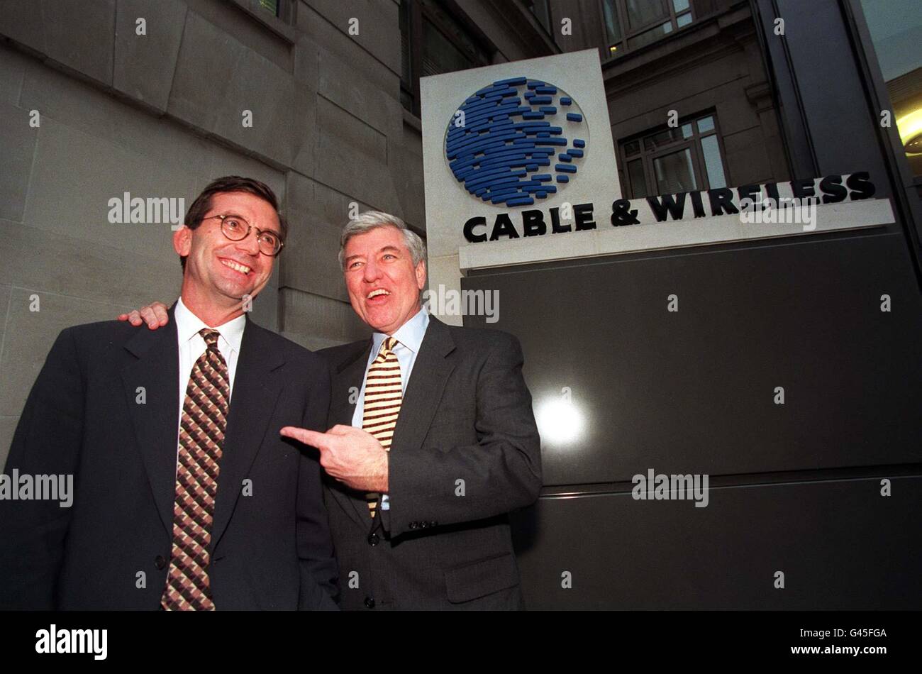 (right) Dick Brown, chief executive of Cable and Wireless PLC and ...
