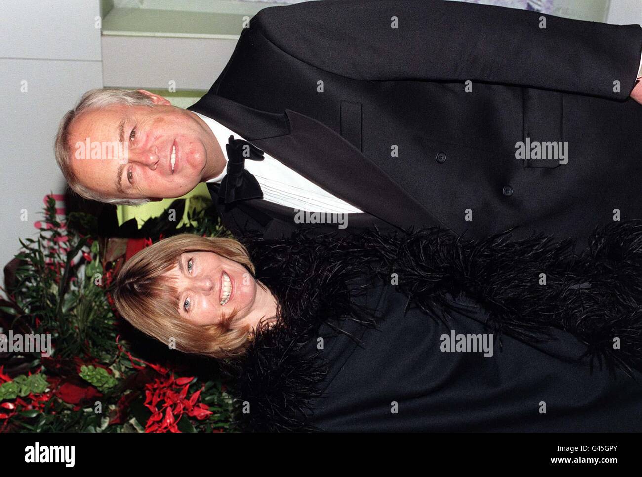 Television newscaster Martyn Lewis with his wife Liz at London's ...