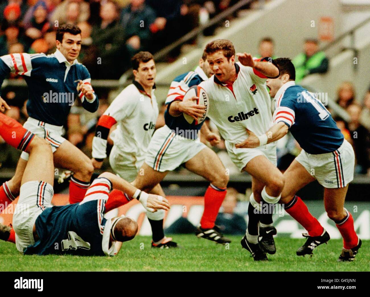 England's Rugby captain Phil De Glanville runs away from the French at ...