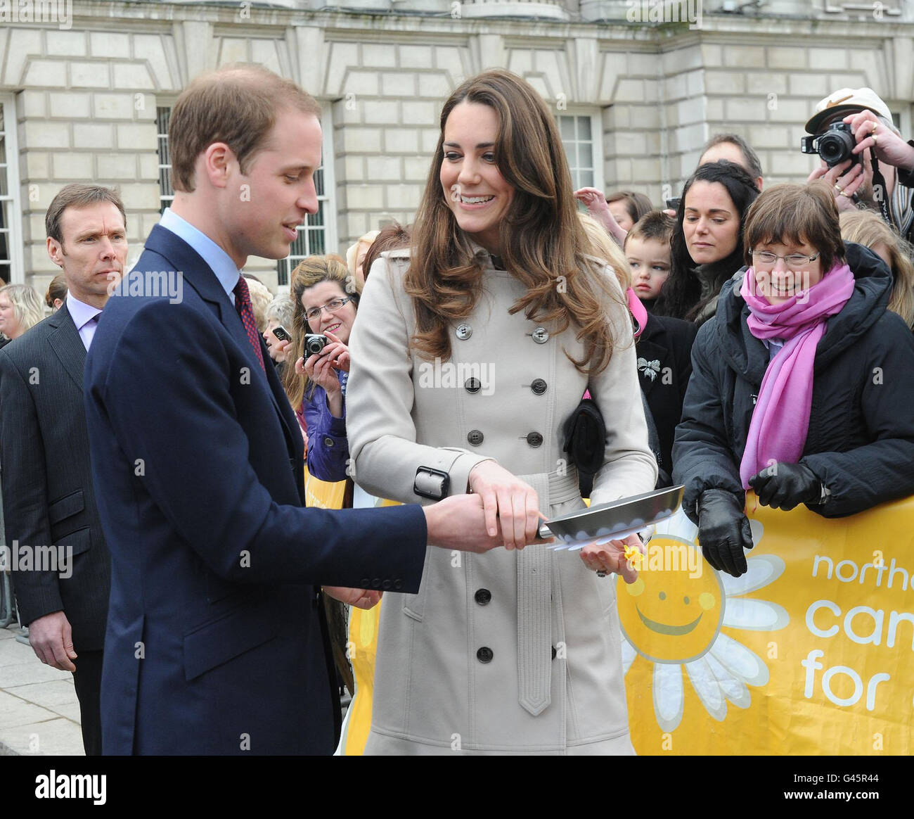 Prince William and Kate Middleton join hands to try flipping a pancake ...