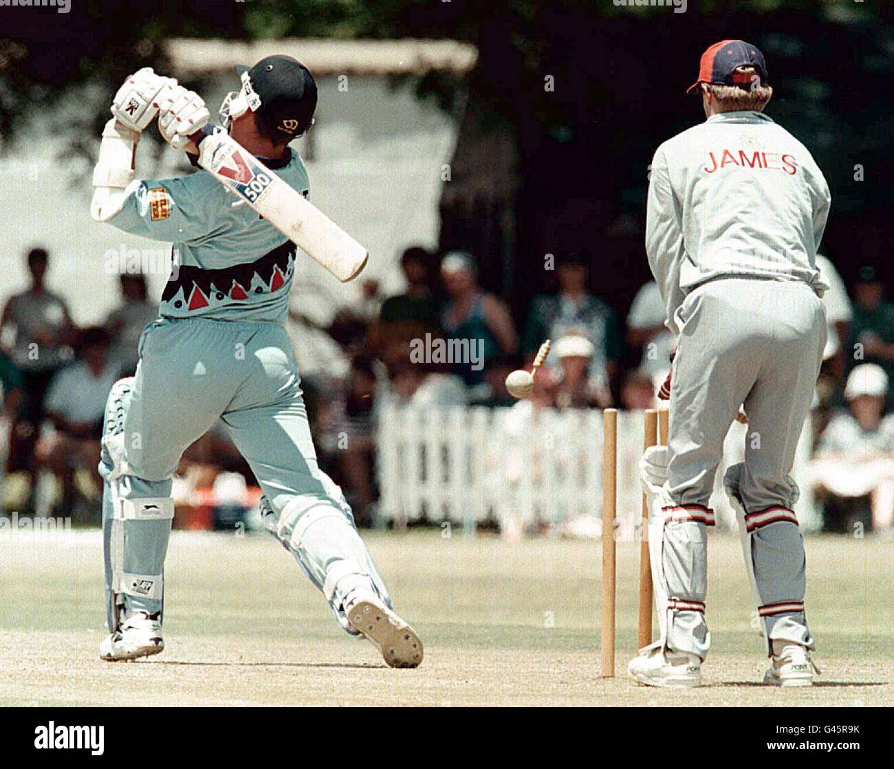 England 's Robert Croft has his wicket shattered by bowler Guy Whittal ...