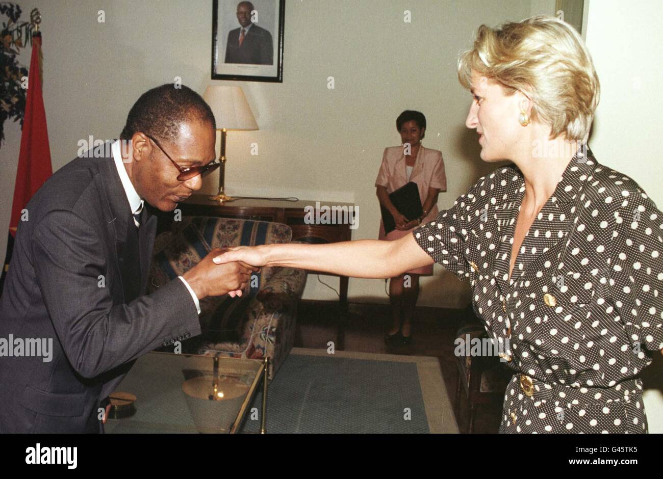 The Princess of Wales shakes hands with the Angolan Prime Minister ...