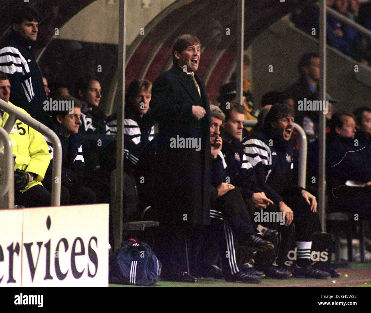 New Newcastle manager Kenny Dalglish shouts some encouragement to the ...