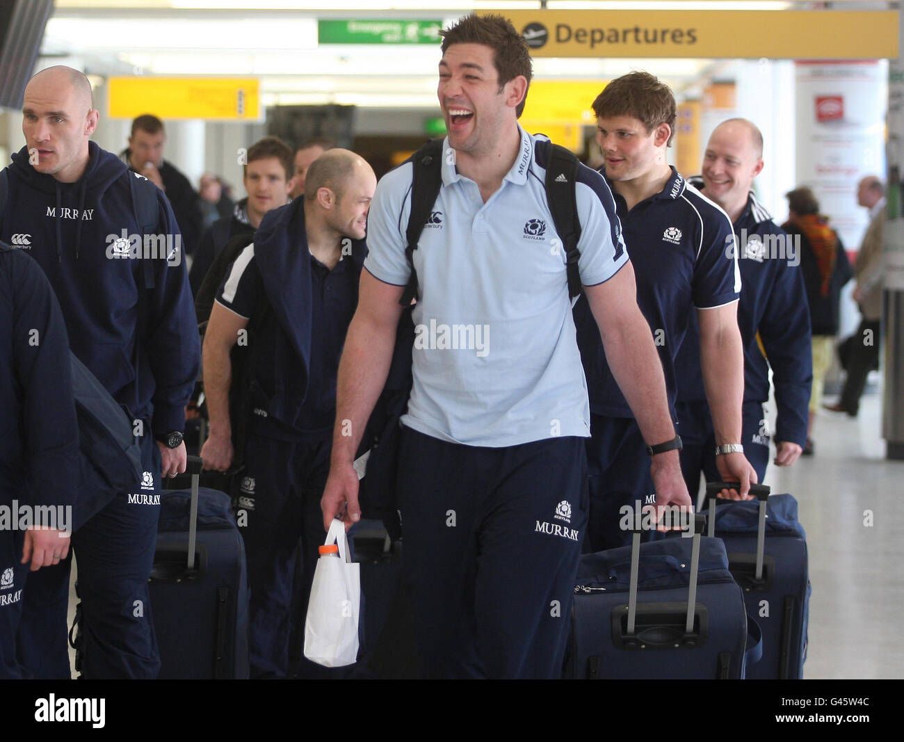 Scotland's Nathan Hines arrives at Edinburgh Airport as the team ...