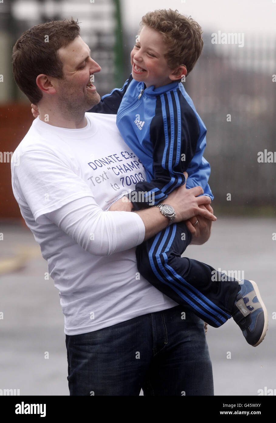Robin Blacklock with his son Angus at Celtic Park in Glasgow, during ...