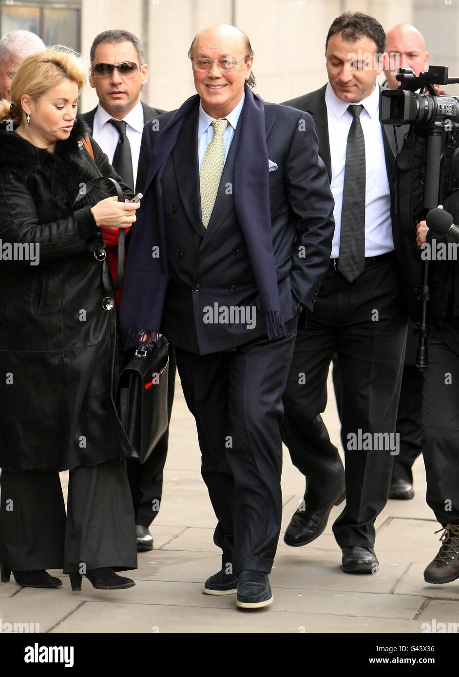 Asil Nadir (centre) arrives at the Old Bailey, in central London Stock ...