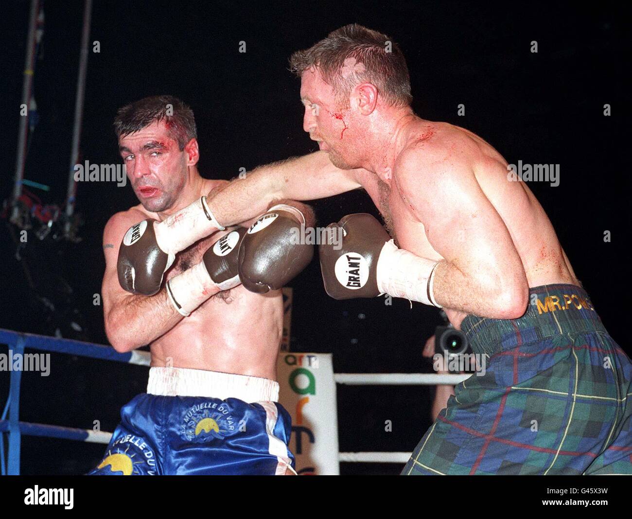 Ireland's Steve Collins (right) delivers a blow to France's Fredeic ...
