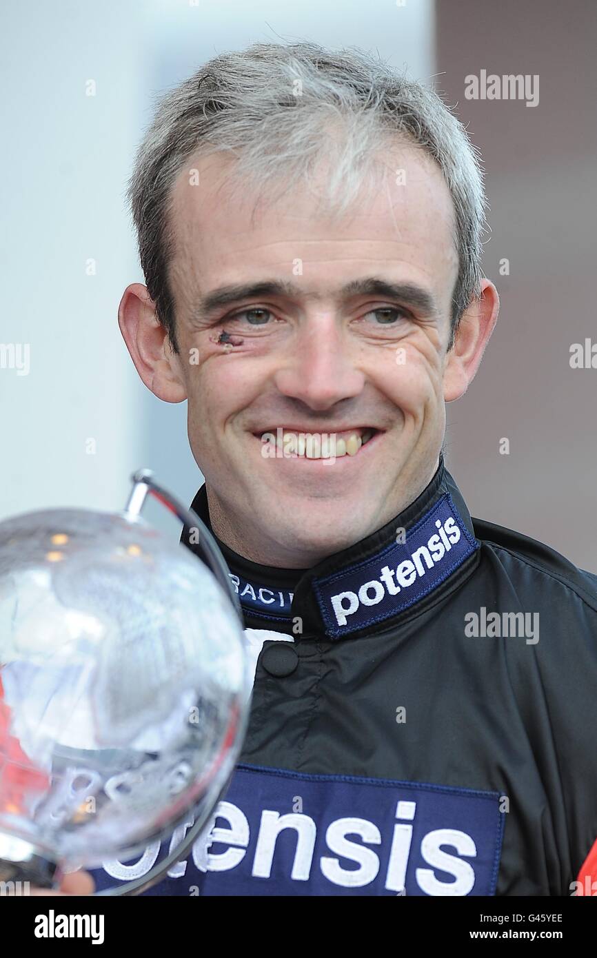 Jockey Ruby Walsh celebrates as he lifts the jockeys' trophy after ...