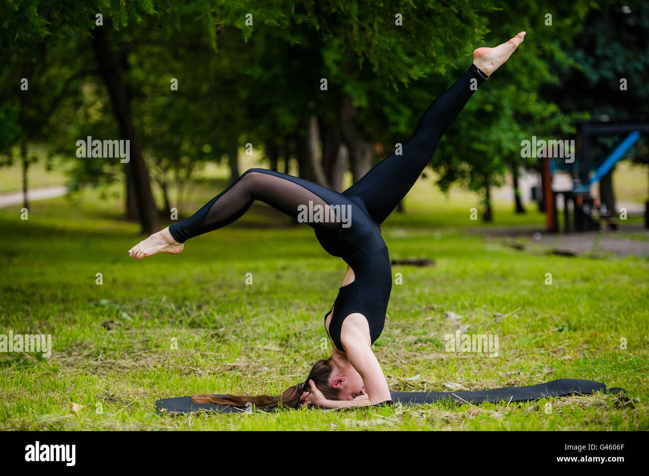 Fitness Woman On Head - Young Attractive Girl Doing The Headstand Stock ...