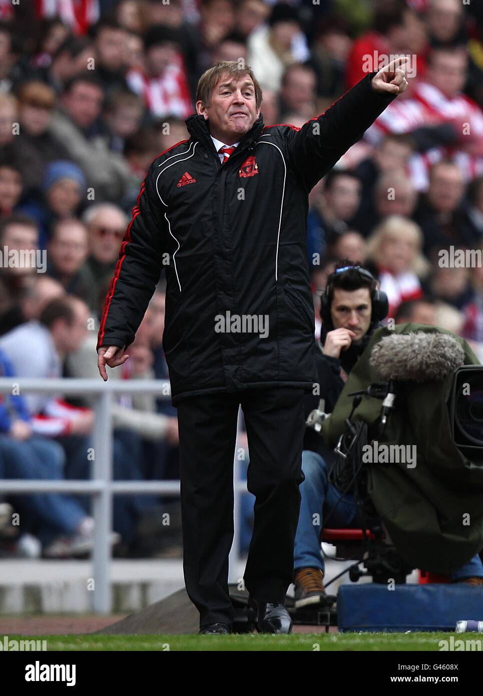 Liverpool manager Kenny Dalglish gestures on the touchline Stock Photo ...