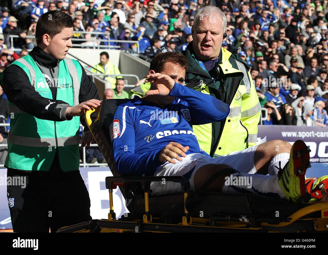 Cardiff City's Michael Chopra is carried off the pitch on a stretcher ...