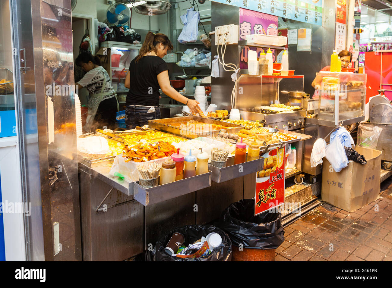 Hong Kong SAR, China - July 26, 2015: A street vendor selling popular ...