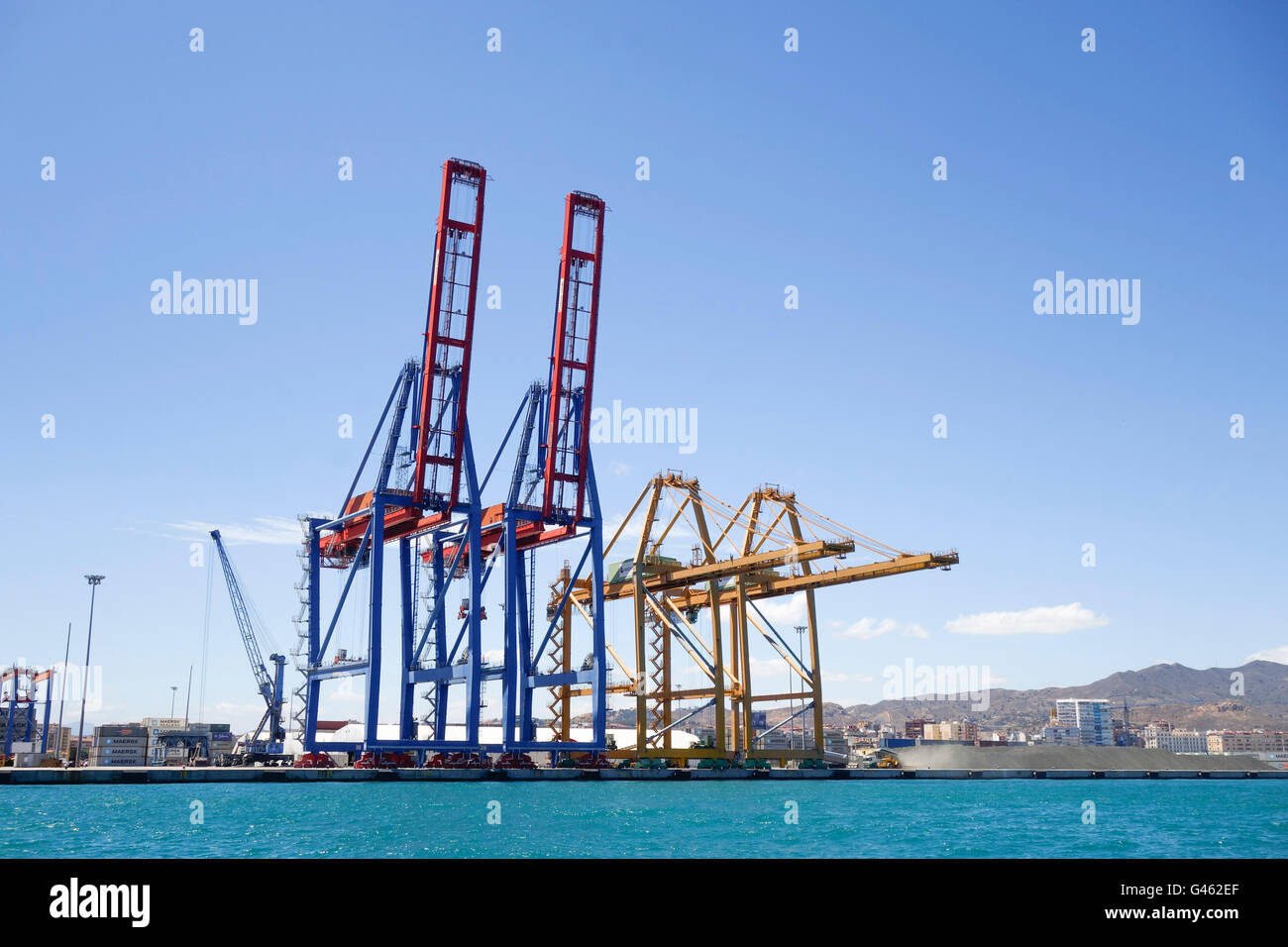 Colorful cranes for loading and unloading at the port of Malaga ...