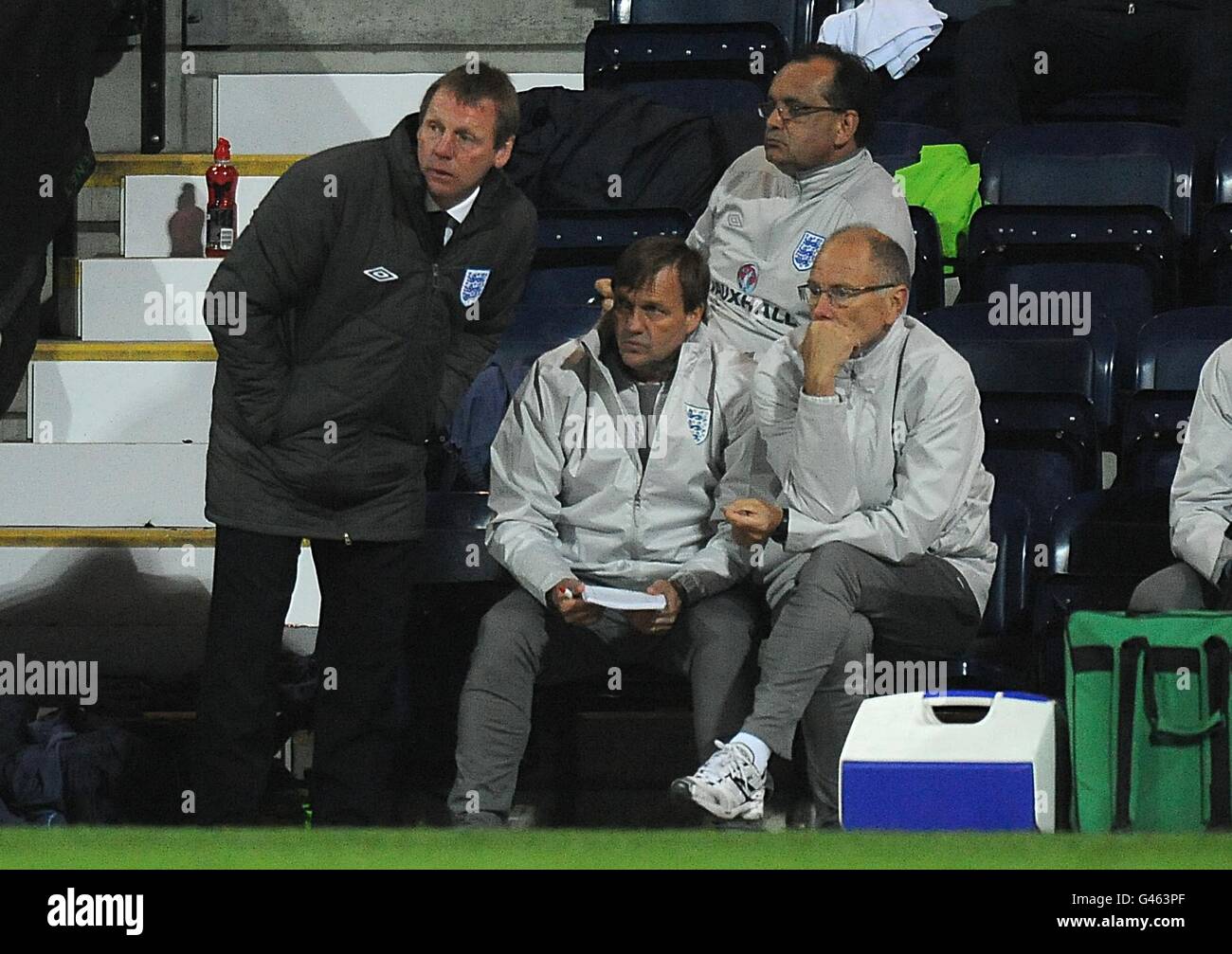 Englands under 21 manager stuart left his assistant steve wigley hi-res ...