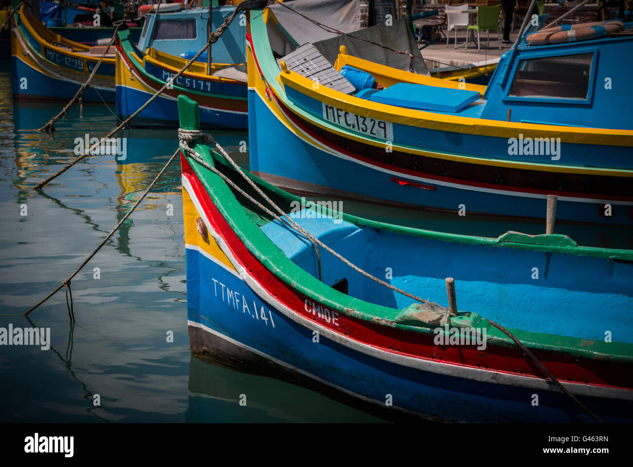 Colourful luzzu boats at Marsaxlokk fishing village, Malta Stock Photo ...