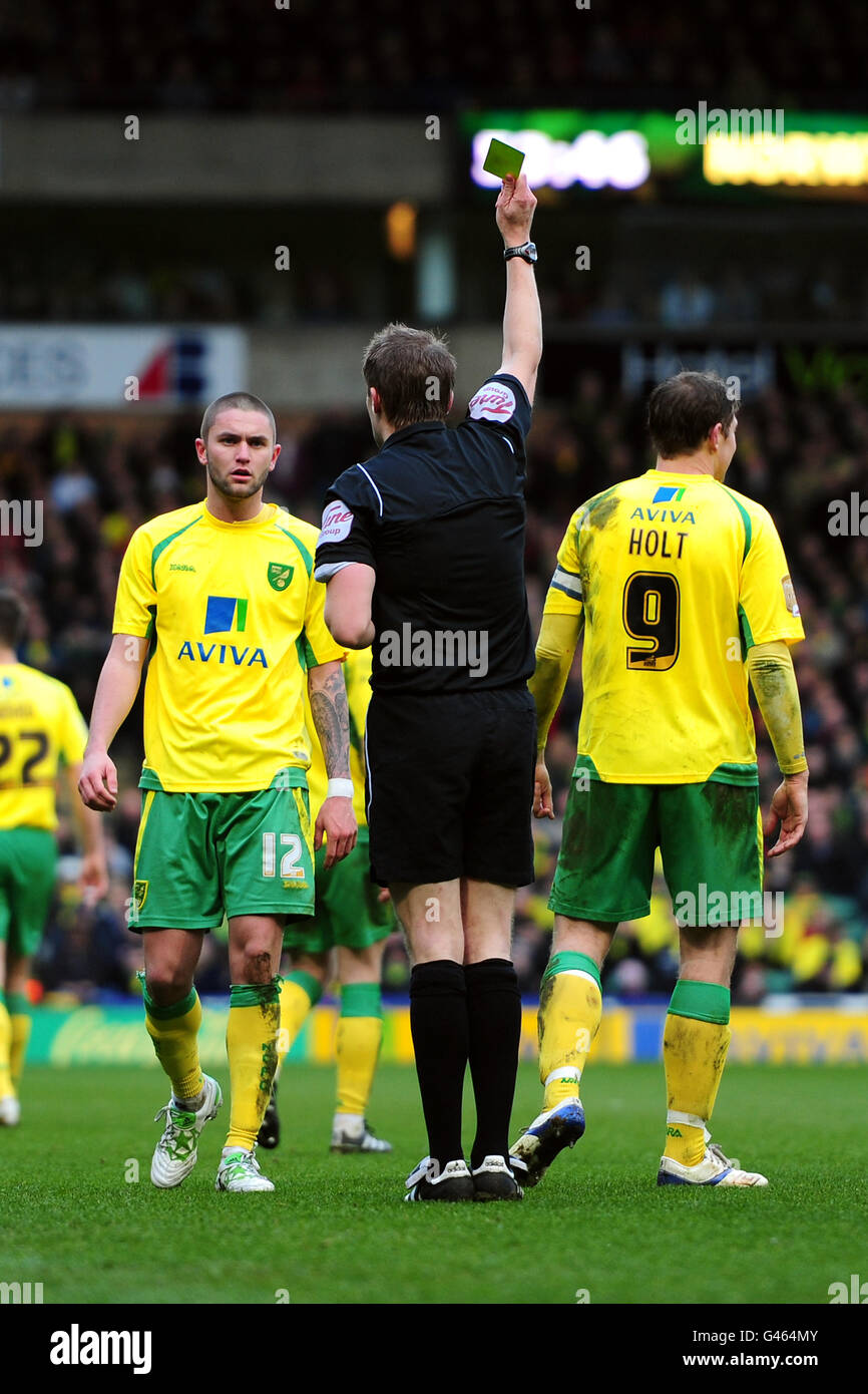Norwich citys henri lansbury receives yellow card from referee craig hi ...