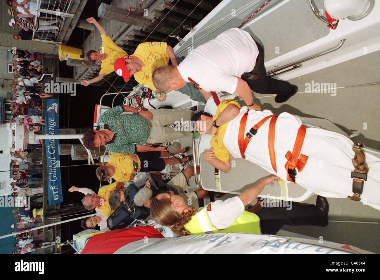Injured crew member Brendan West is stretchered off the Yacht Time and ...