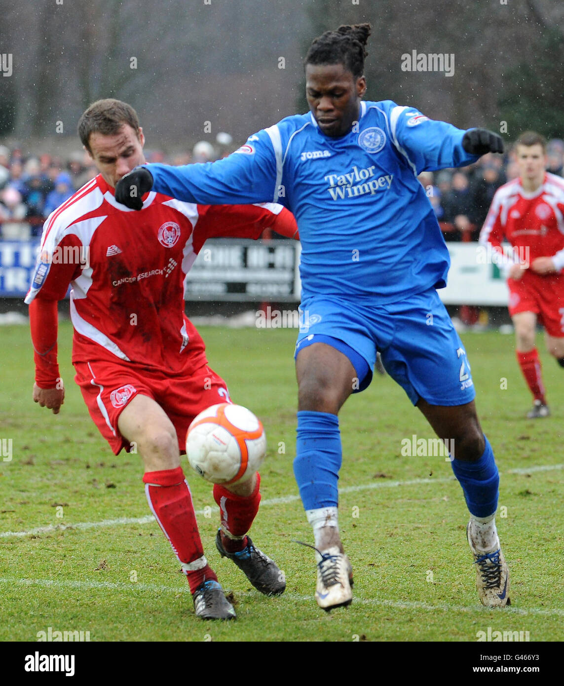 St Johnstone's Colin Samuel (right) is challenged by Brechin City's ...