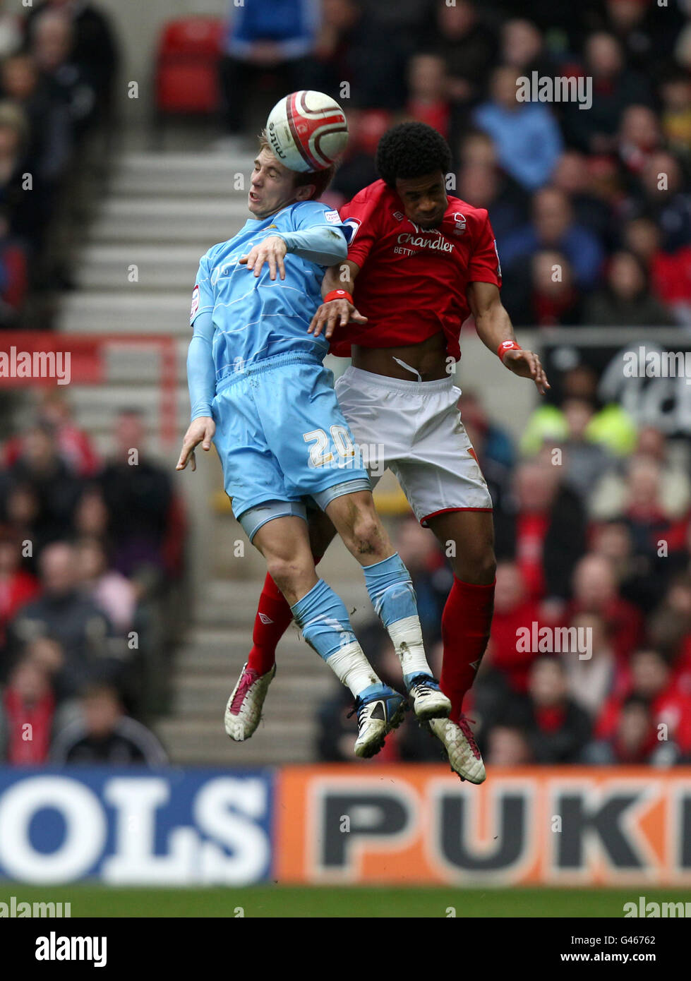 Nottingham Forest's Garath McCleary battles for possession of the ball ...