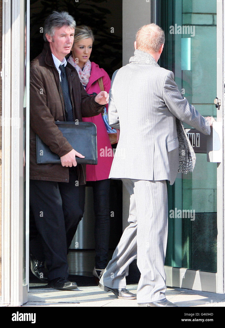 Hazel Stewart's husband David (left) and daughter Lisa, leave Belfast ...