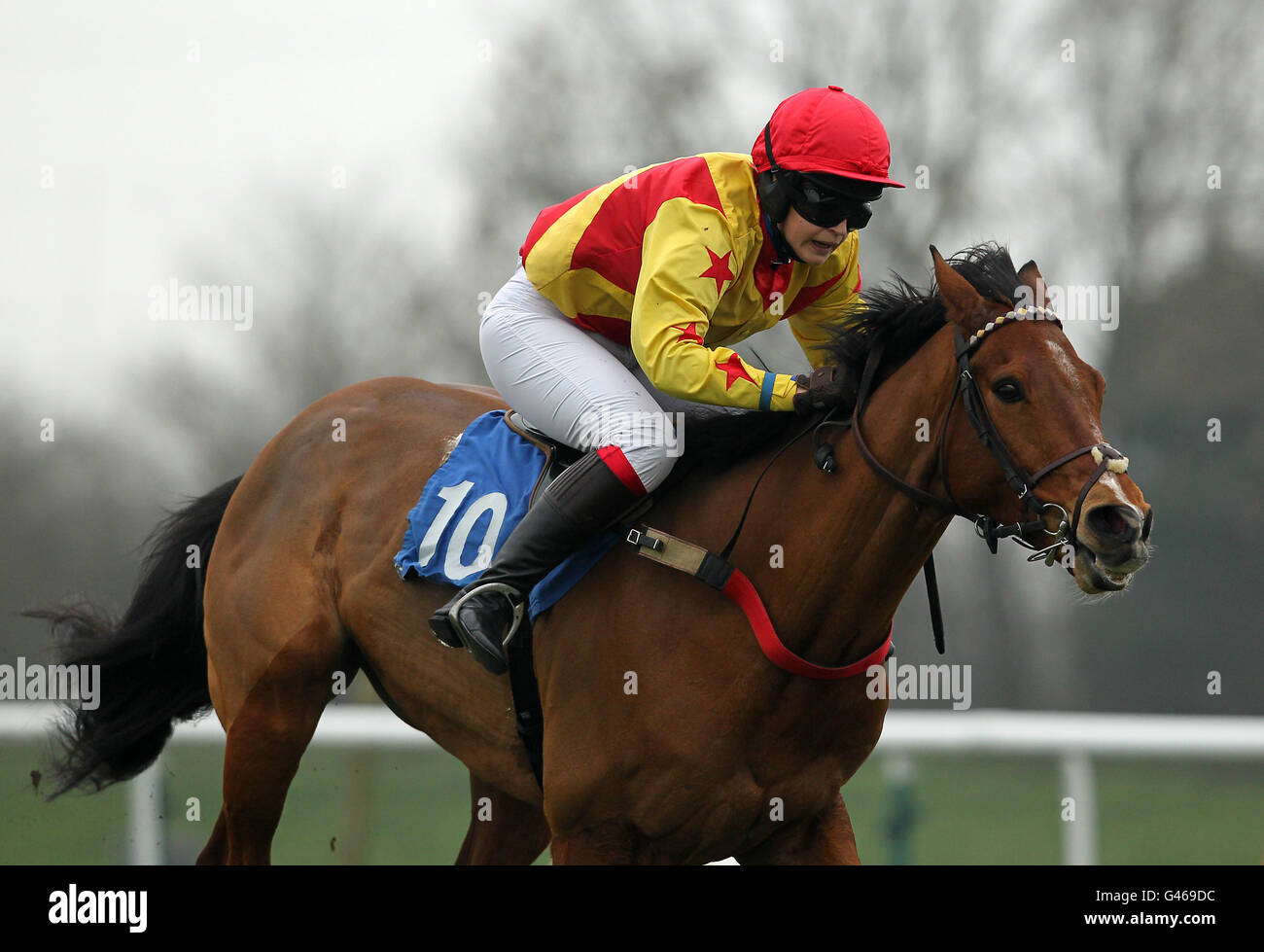 Samizdat ridden by jockey Emma Sayer jumps the last fence to win the ...