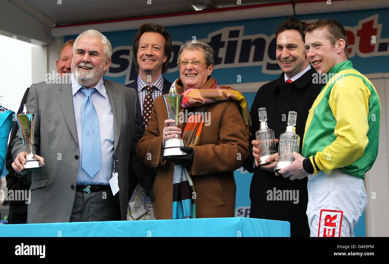 Owners Alan Potts (left) and Ann Potts (centre), trainer Henry de ...