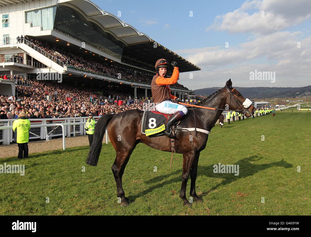 Jockey Sam Waley-Cohen celebrates winning the totesport Cheltenham Gold ...