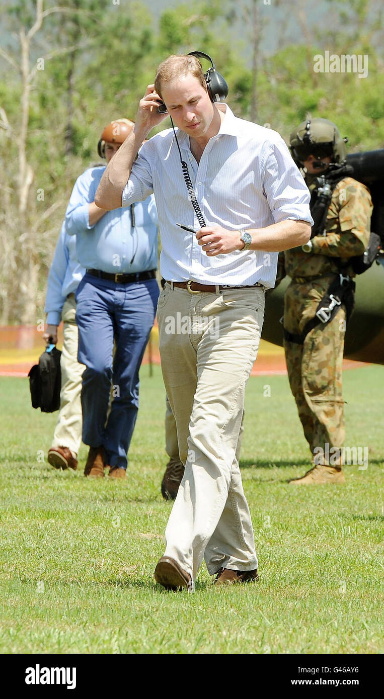 Prince William removes his ear defenders after arriving by Black Hawk ...