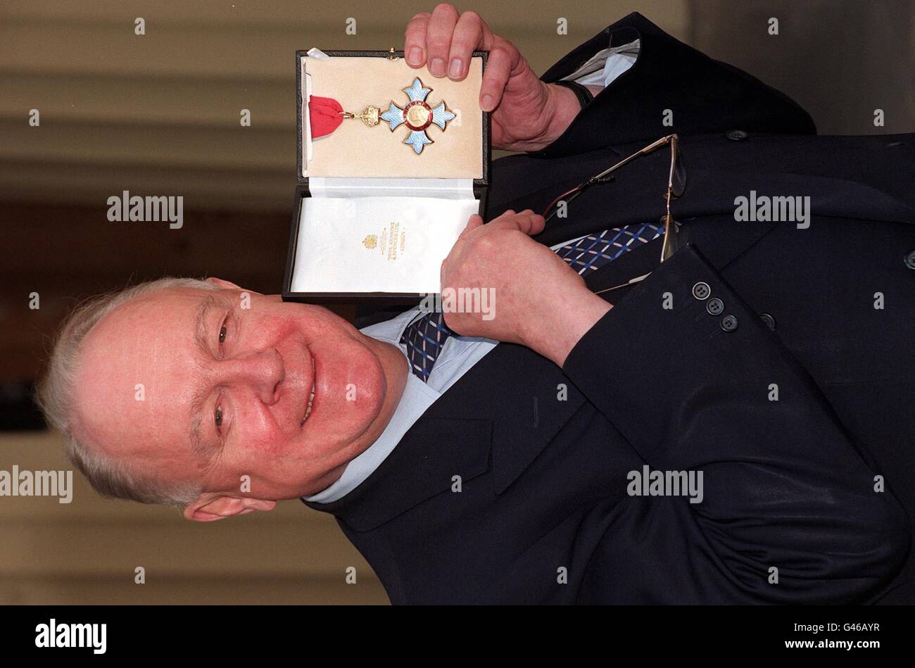 Receiving cbe buckingham palace hi-res stock photography and images - Alamy