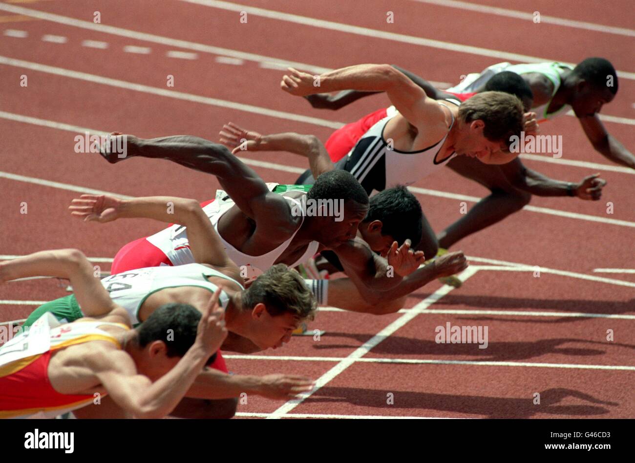 MENS 100m HEAT. RUNNERS [Inc LINFORD CHRISTIE, ENGLAND] OFF THE BLOCKS ...