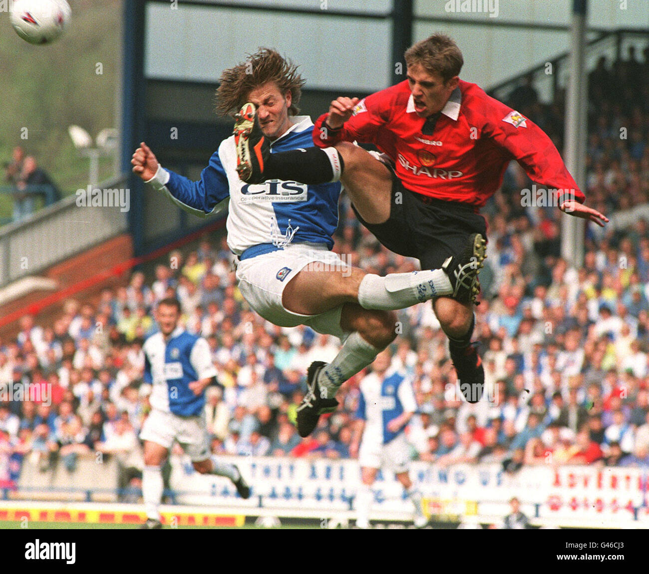 A mid air tackle as Tim Sherwood (left) of Blackburn Rovers, battles it ...