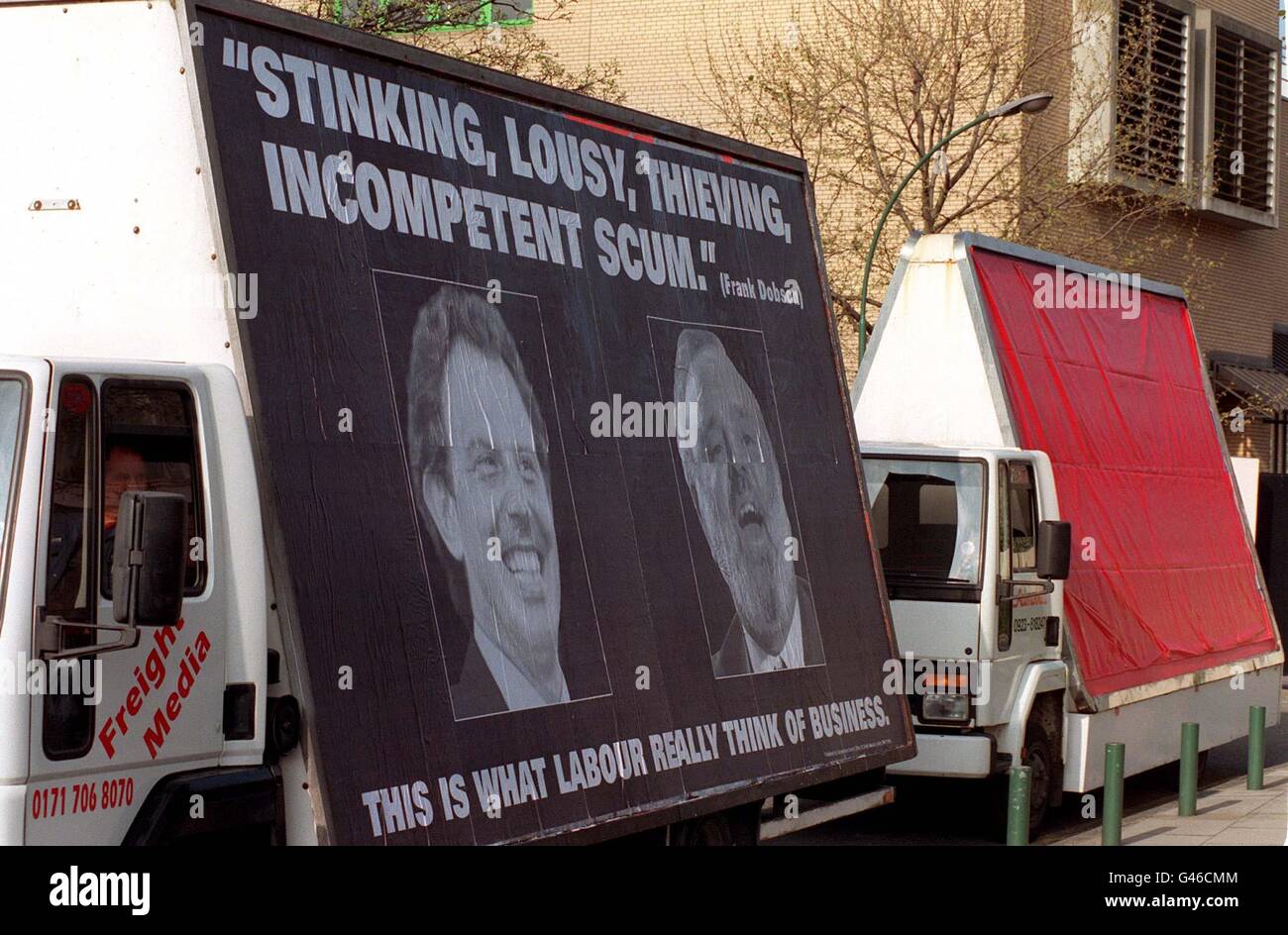 The new Labour poster is blocked-in by a Conservative billboard as it ...