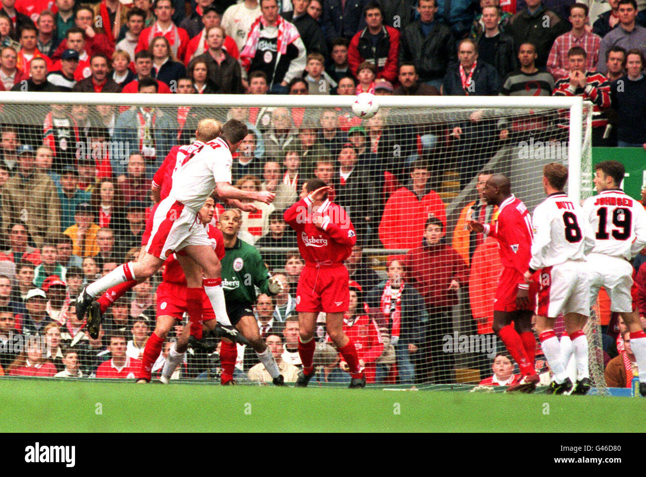 The Liverpool Kop is stunned into silence as Gary Pallister rises to ...