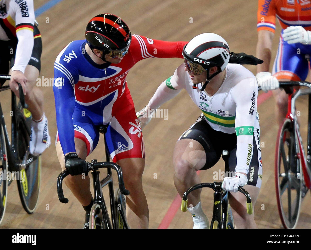 Great Britain's Sir Chris Hoy (left) congratulates Australia's Shane ...
