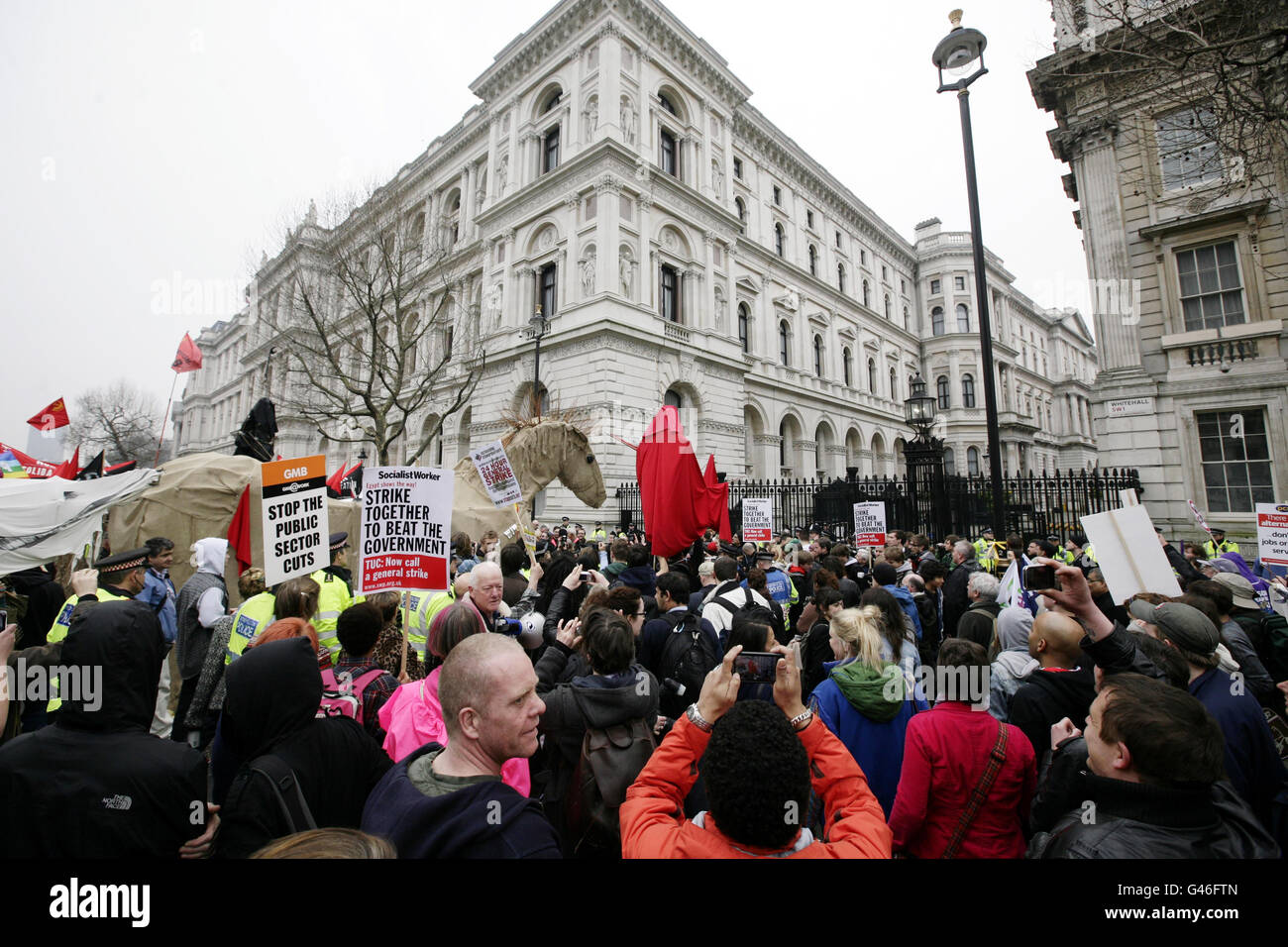 Protesters stand outside Downing Street during the TUC March For The ...
