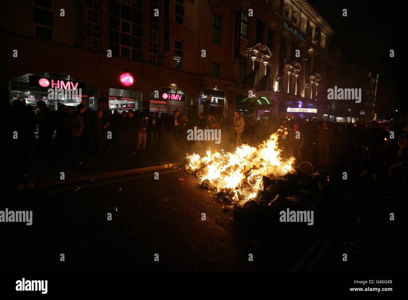 A fire is lit in Piccadilly after the TUC March For The Alternative at ...