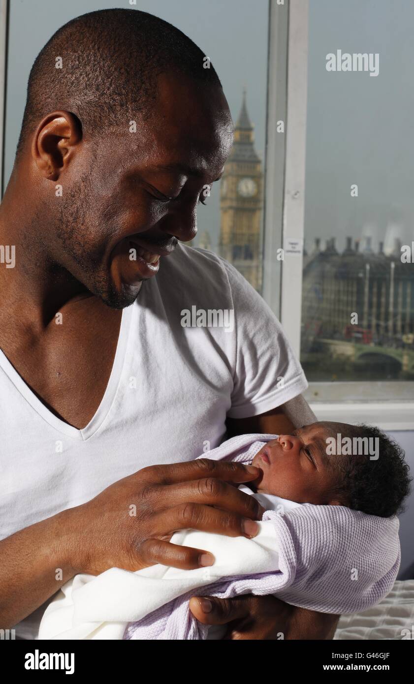 Dominic Musafiri with baby Hope Eunice Eden at Guy's and St Thomas ...