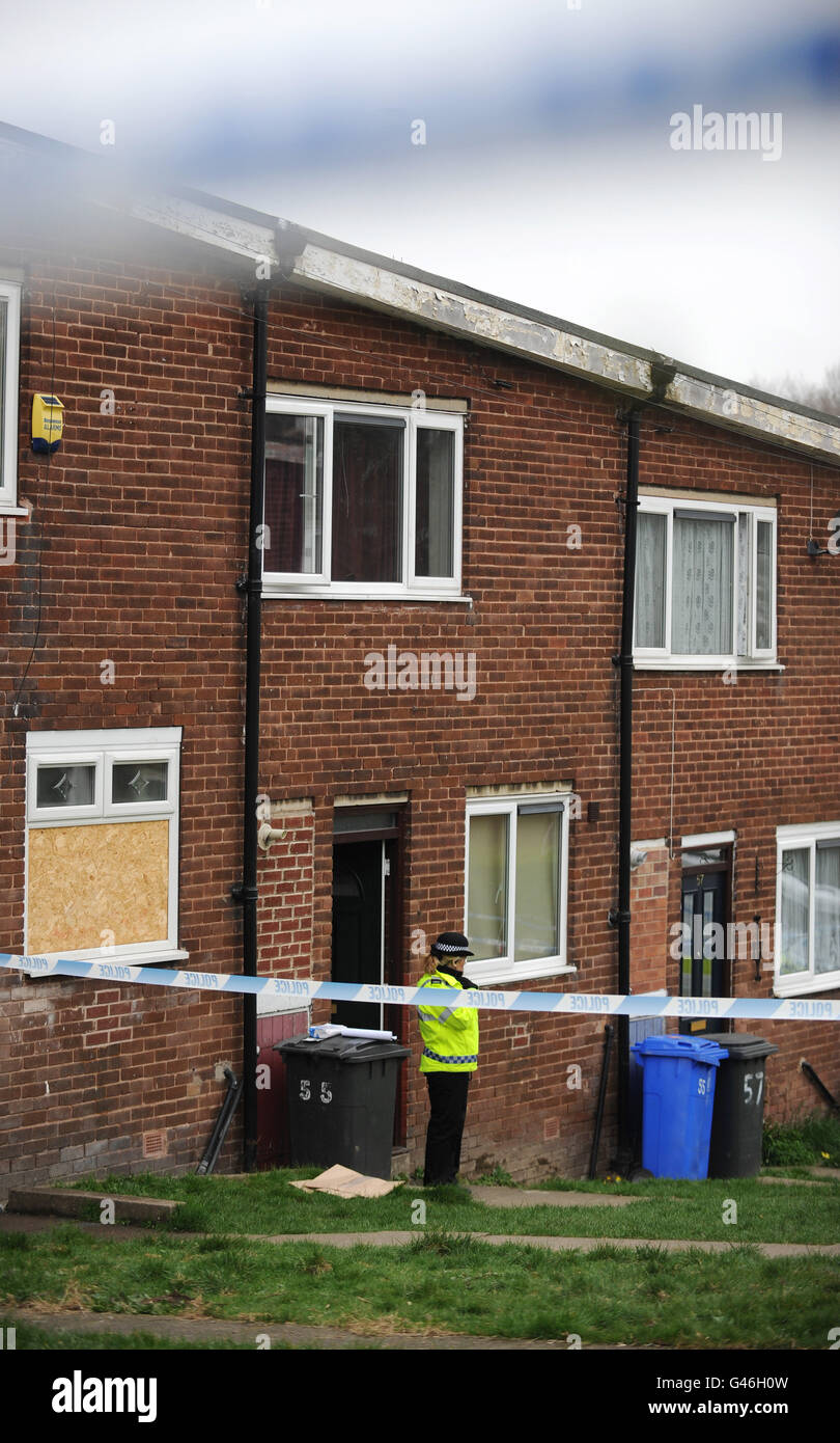 A police officer stands outside a house in ironside road hi-res stock ...