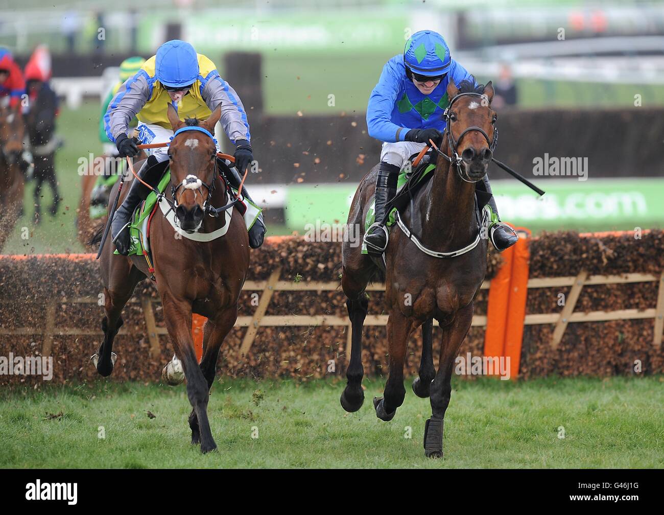 Hurricane Fly ridden by Ruby Walsh (right) leads from Peddlers Cross ...