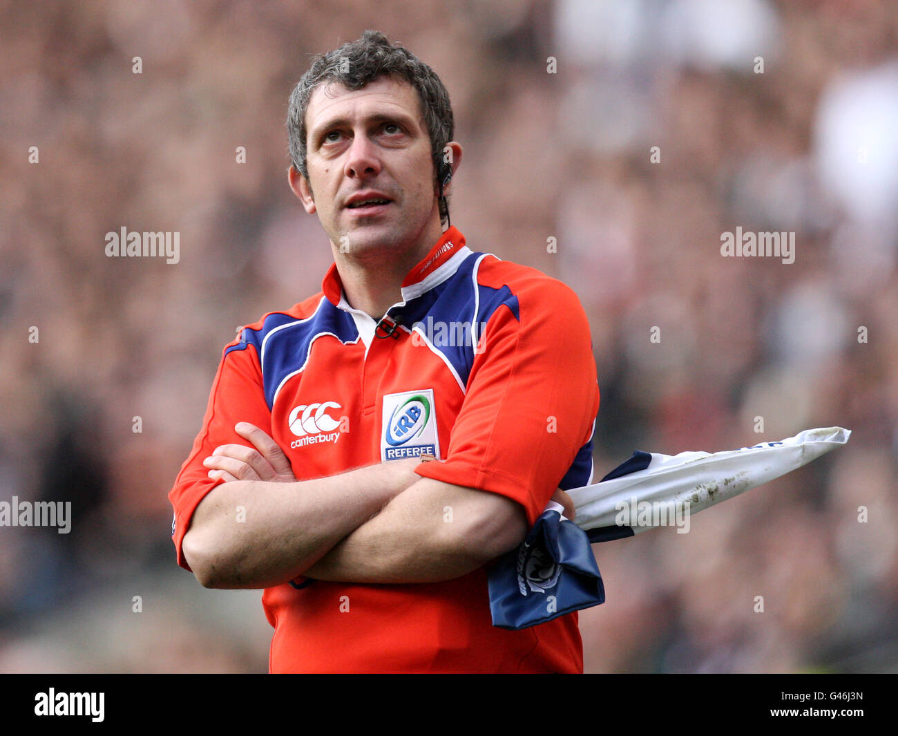 The touch judge holds his flag under his arm hi-res stock photography ...