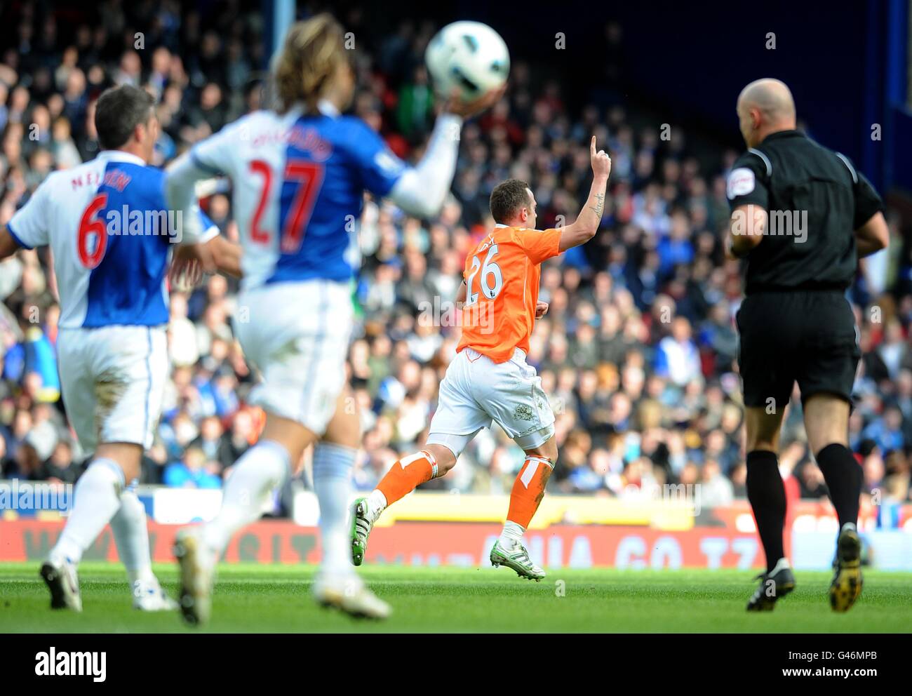 Blackpool's Charlie Adam (centre) celebrates scoring his side's second ...
