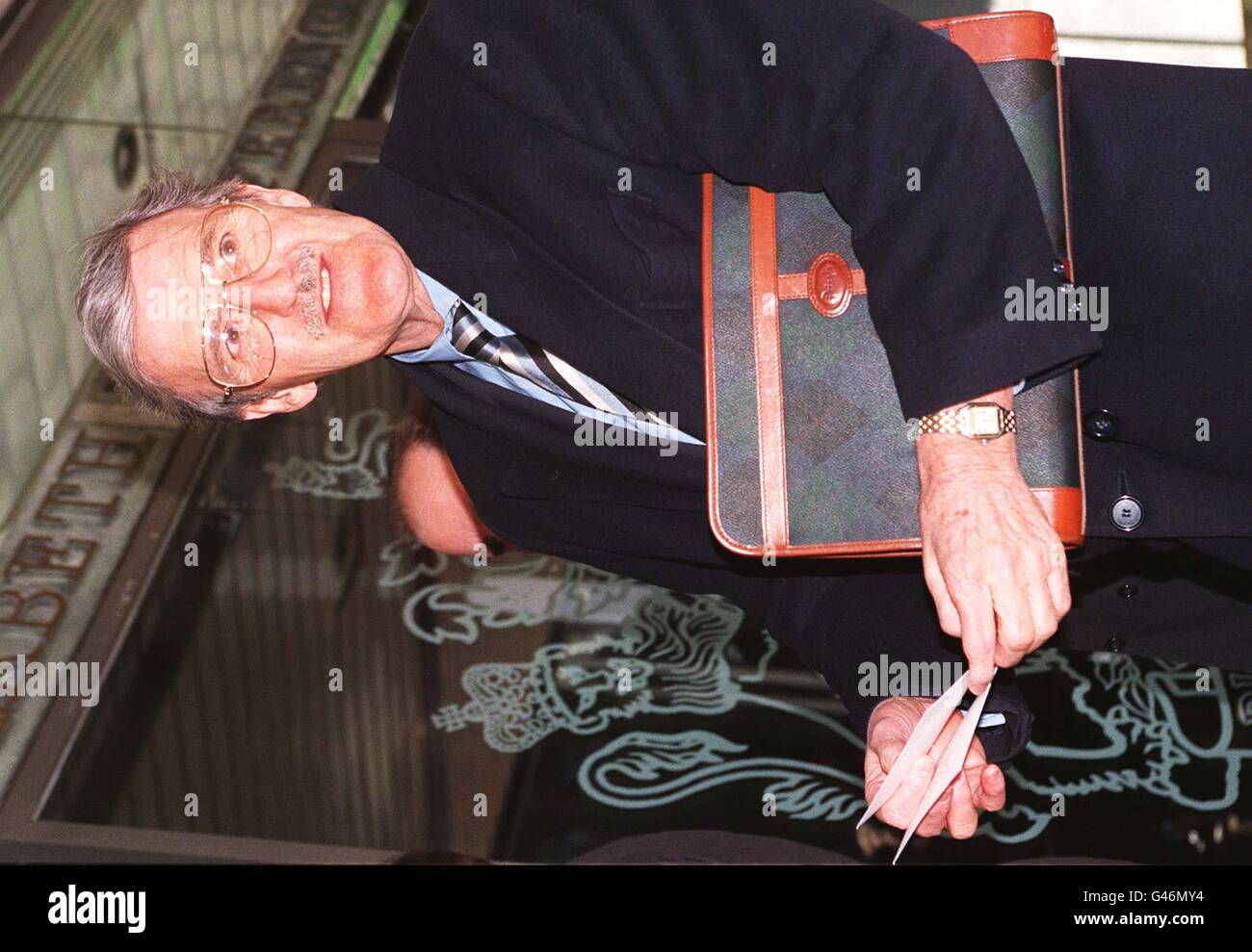 Football commentator Jimmy Hill arriving at London's QEII Centre this ...