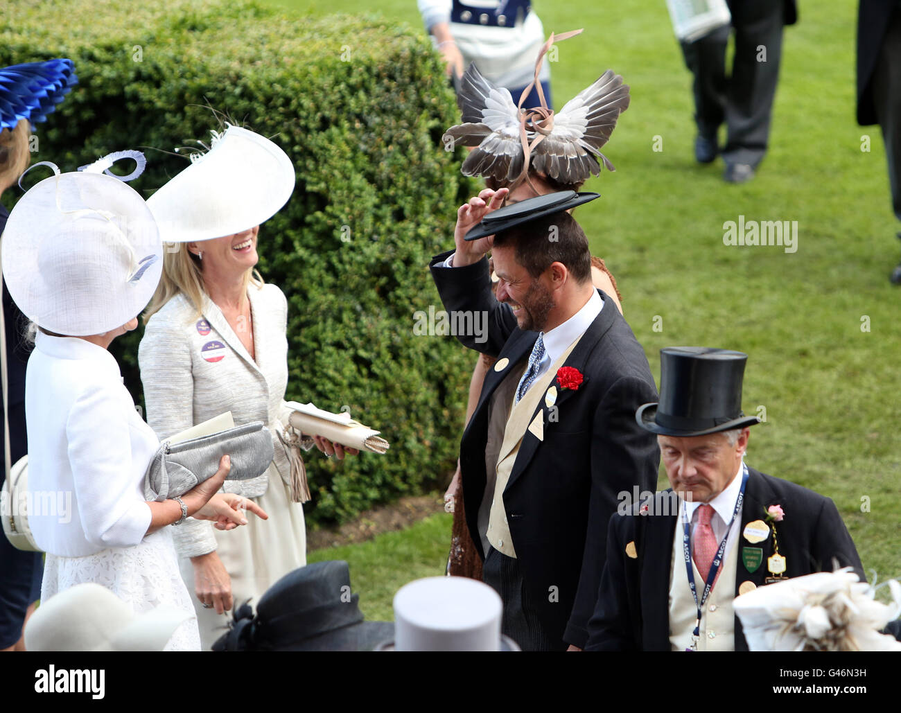 Actor Dominic West (right) collapses his top hat during day four of ...