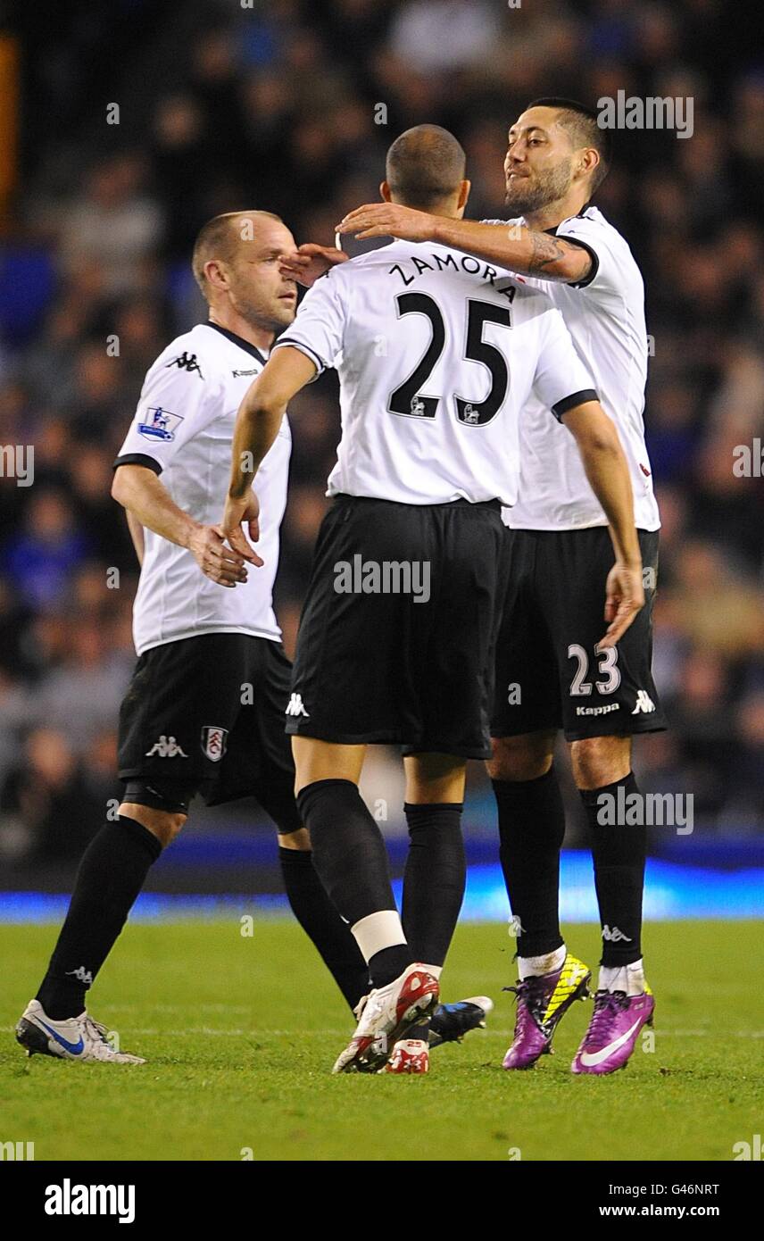 Fulham's Clint Dempsey (right) celebrates scoring their first goal of ...
